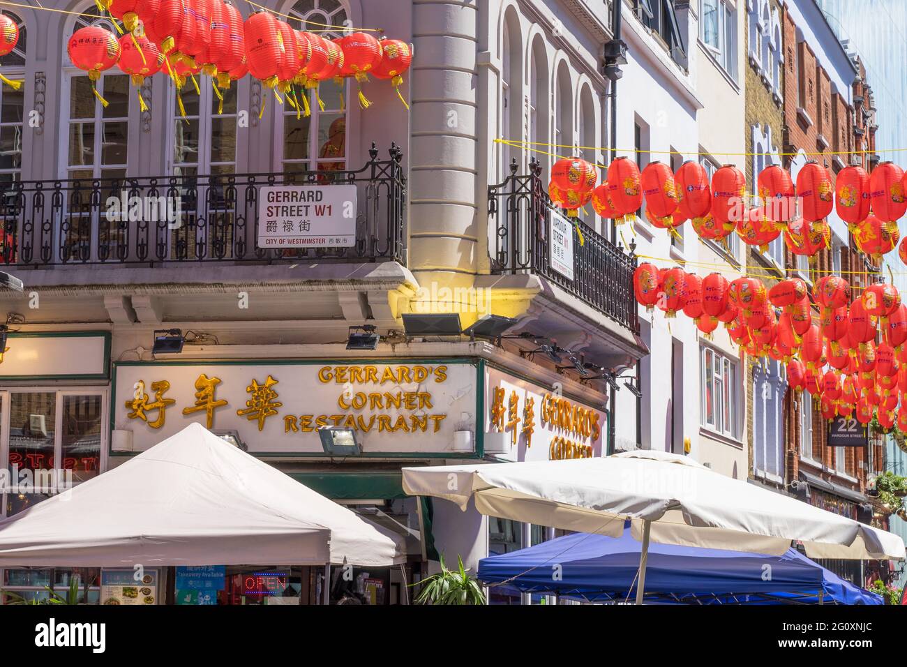 Gerrard Street on London's Chinatown with red Chinese lanterns hanging ...