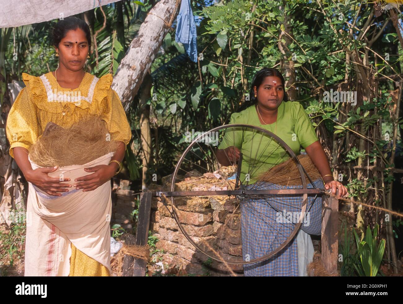 ALLEPPEY, KERALA, INDIA - Women spinning coir, coconut fiber, into ...