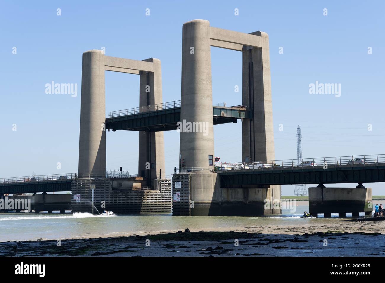 Kingsferry Bridge open up half way to allow sailing boat to go through ...