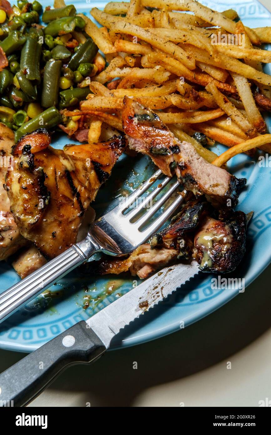 Honey mustard grilled chicken thigh dinner served with home-made ...