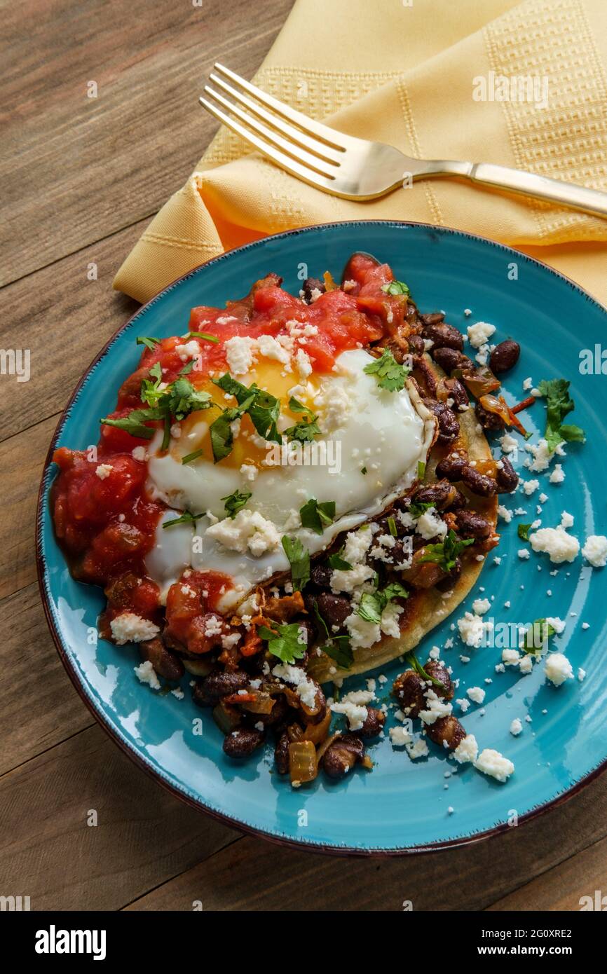 Mexican breakfast huevos rancheros fried egg tostada with chorizo and ...