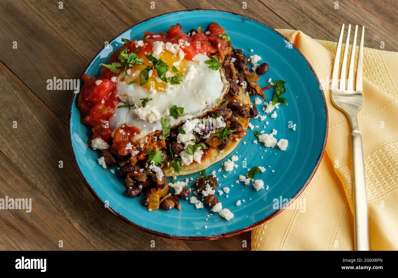 Mexican breakfast huevos rancheros fried egg tostada with chorizo and ...