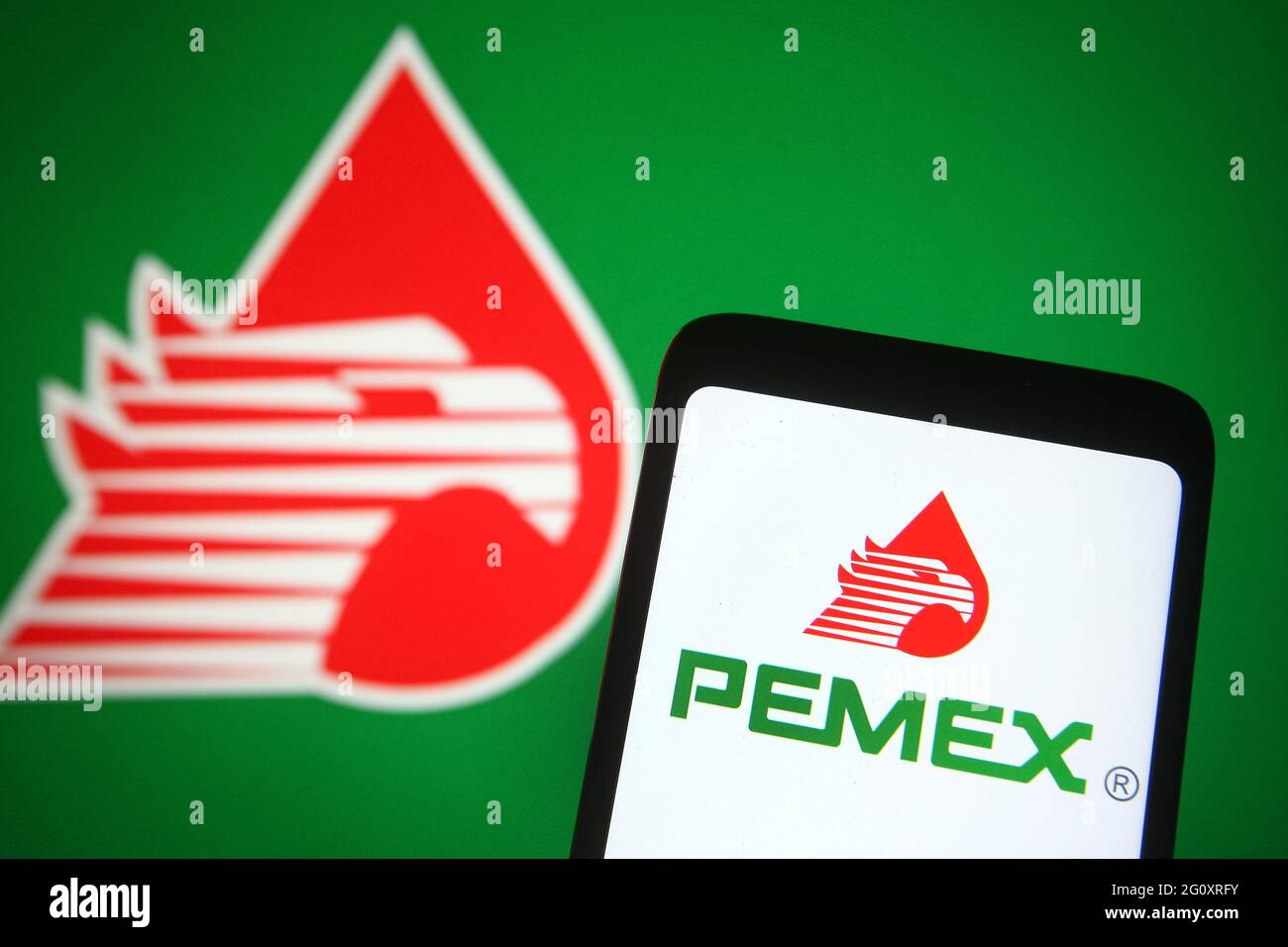 In this photo illustration, a Pemex (Mexican Petroleum) logo is seen on ...