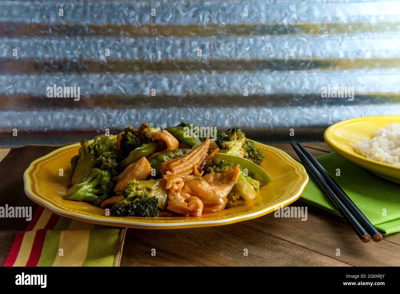 Chinese Hunan style spicy chicken with mixed sauteed vegetables and ...