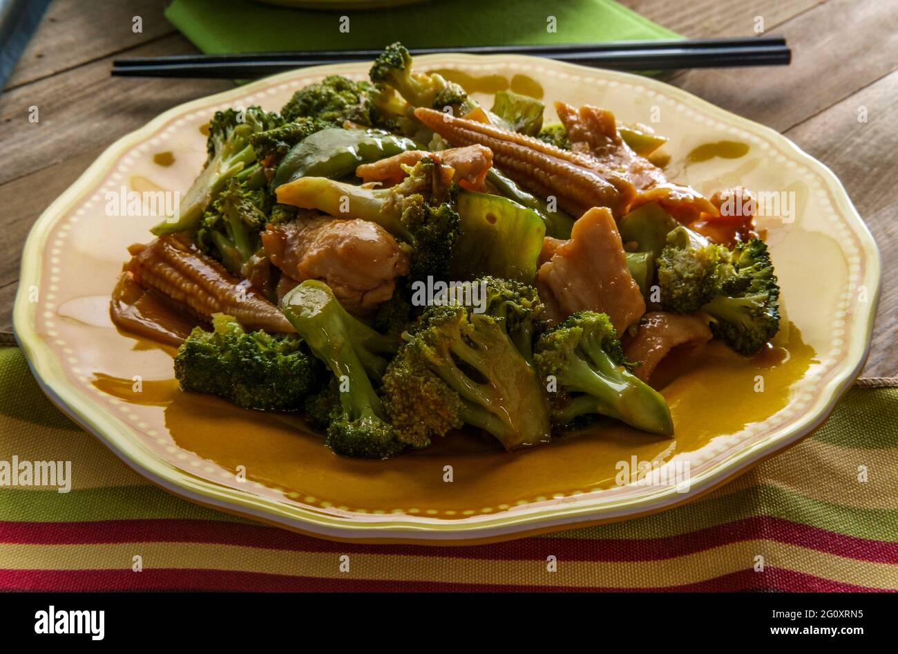 Chinese Hunan style spicy chicken with mixed sauteed vegetables and ...