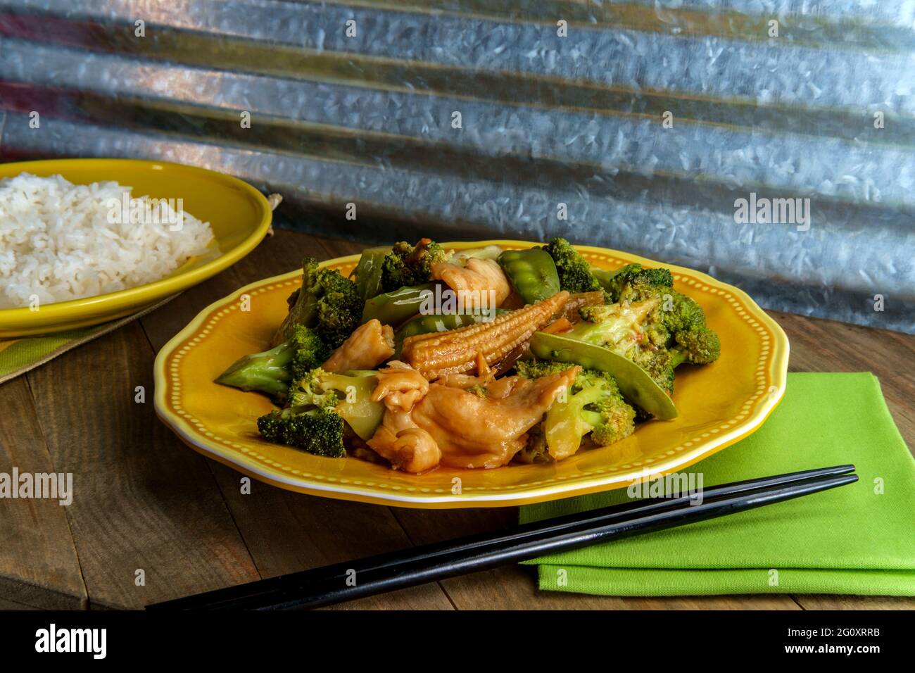 Chinese Hunan style spicy chicken with mixed sauteed vegetables and ...