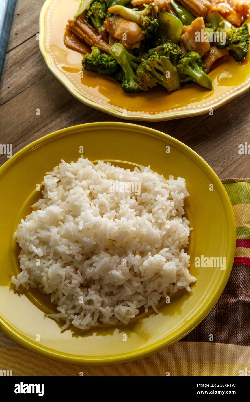 Chinese Hunan style spicy chicken with mixed sauteed vegetables and ...