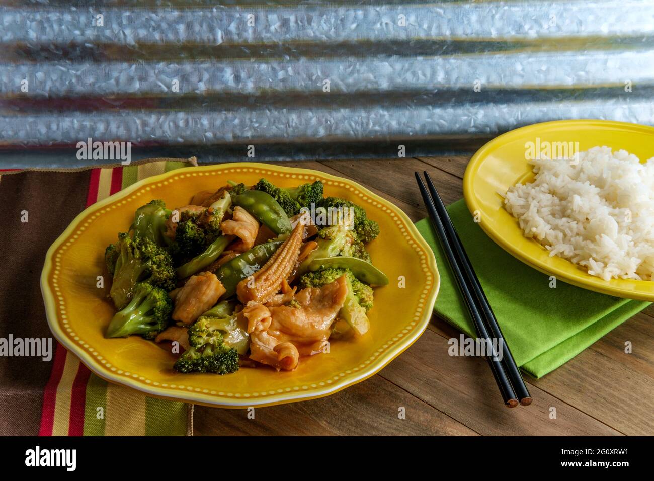 Chinese Hunan style spicy chicken with mixed sauteed vegetables and ...