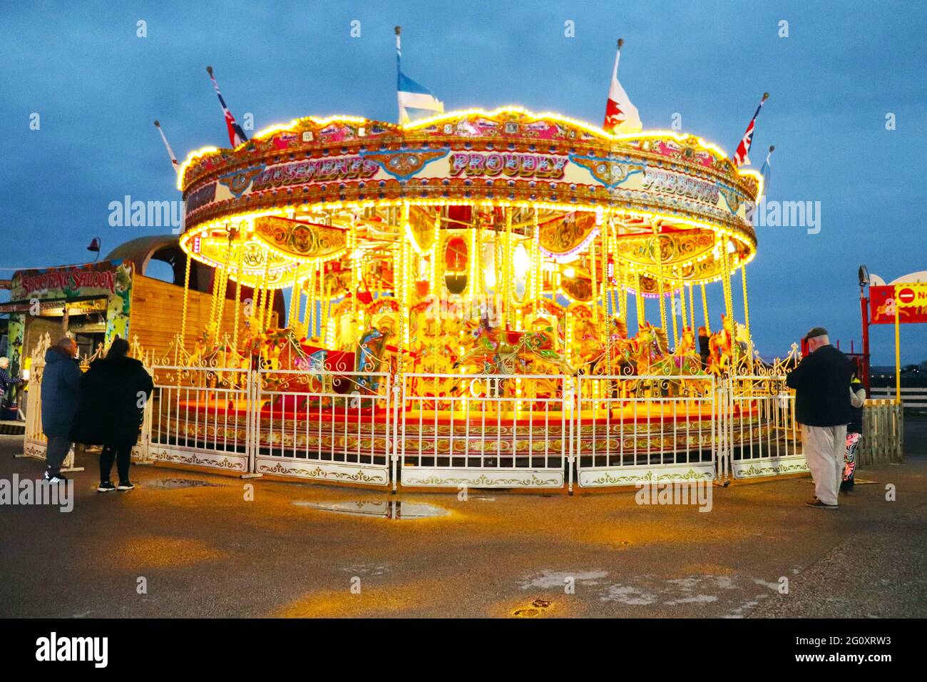 merry go round at a fairground Stock Photo - Alamy