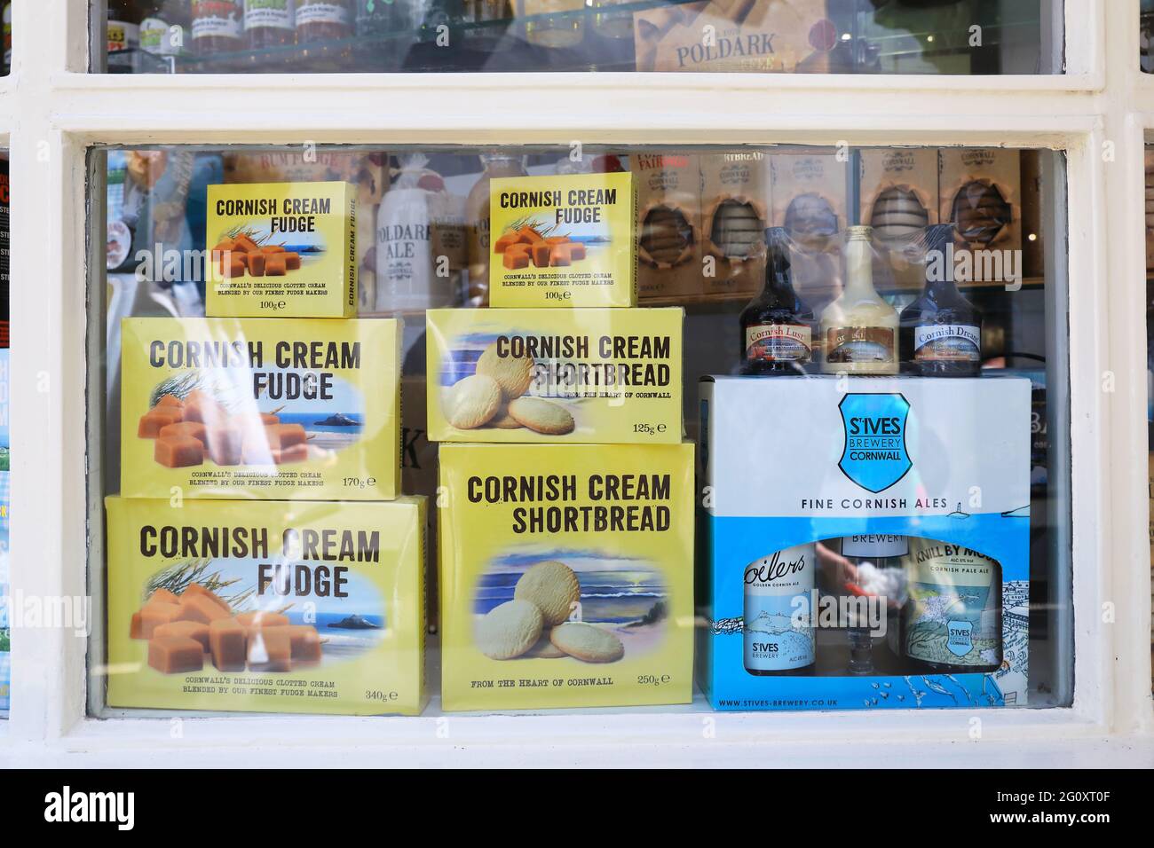 Traditional speciality food shopping in pretty St Ives, in Cornwall, UK ...