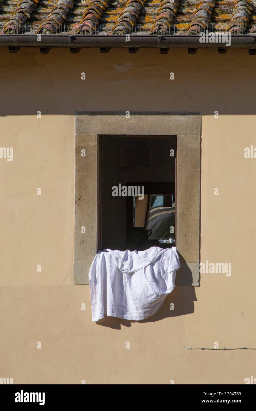 bed sheet hang from building window Stock Photo - Alamy