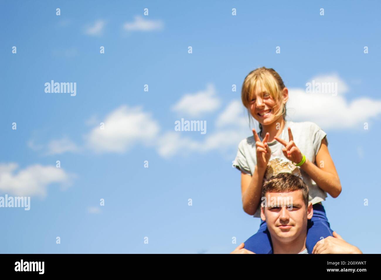 Man with child on his shoulder blue hi-res stock photography and images ...