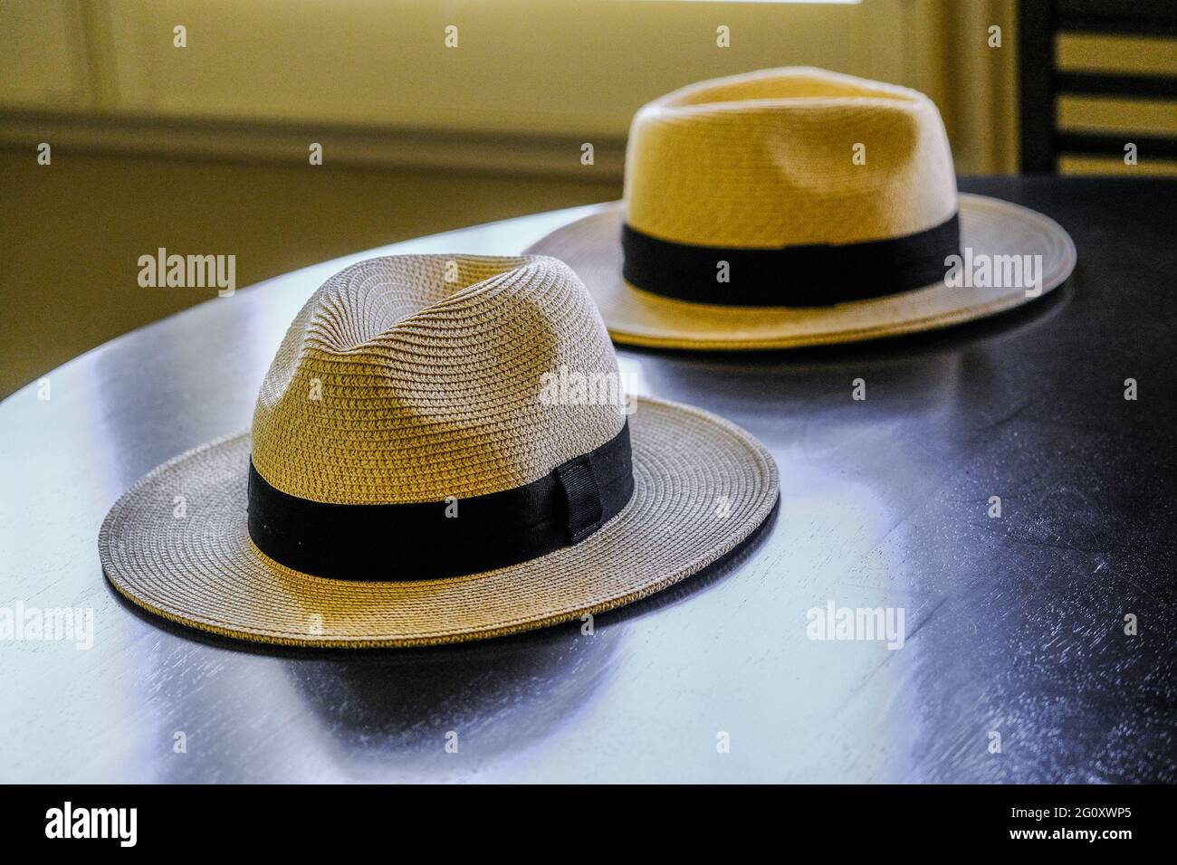 Hats on a table hi-res stock photography and images - Alamy