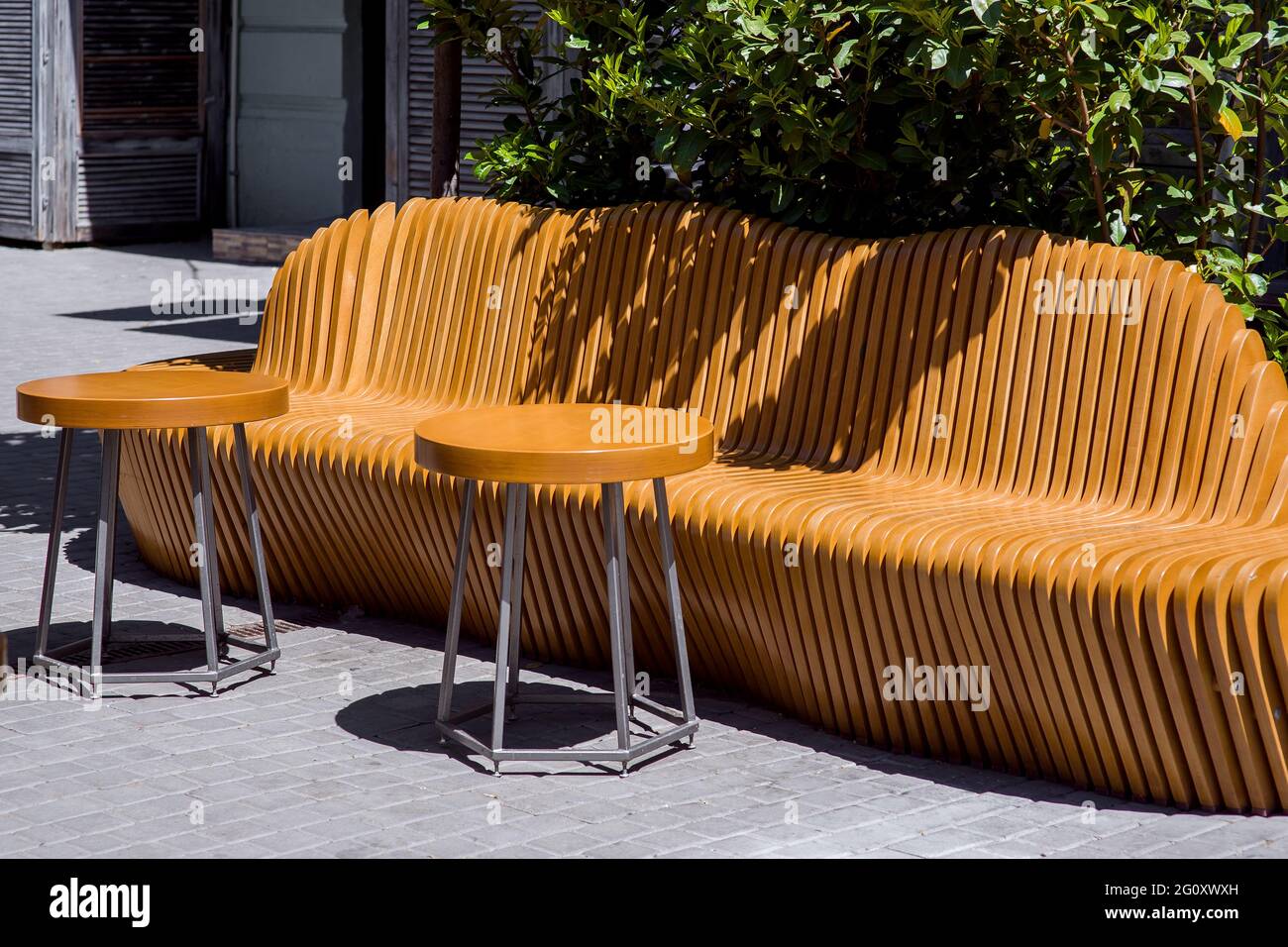 wooden art bench with creative design of brown wooden planks with round ...