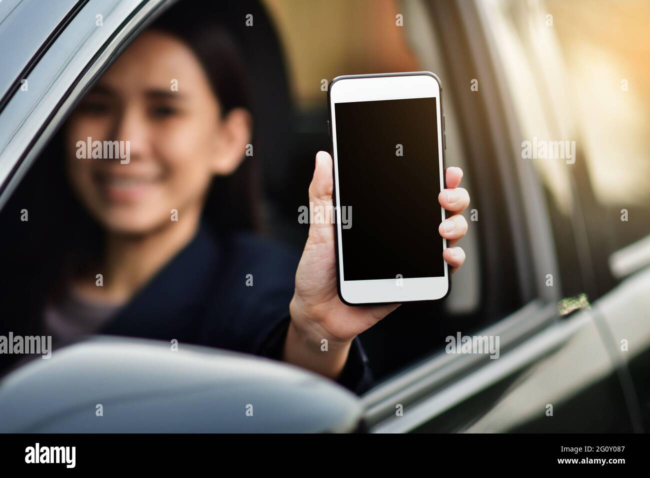 Women holding smartphone showing on screen mobile technology Stock ...