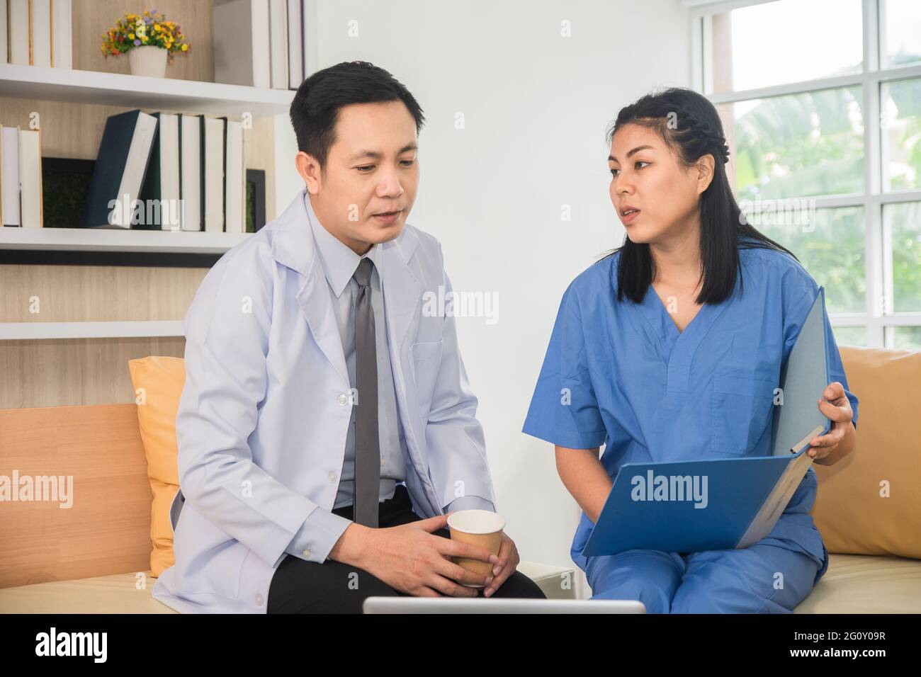 Team doctors meeting to plan the treatment of the patient. Doctors ...