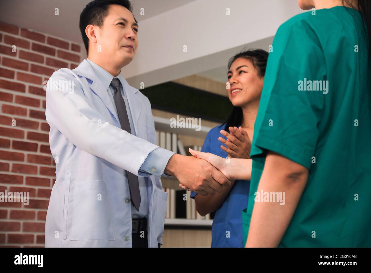 Team work doctor shake hand success in meeting room hospital, Hand ...