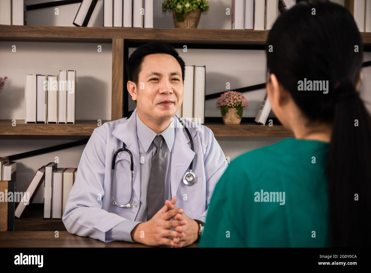 Team doctors meeting to plan the treatment of the patient. Doctors ...