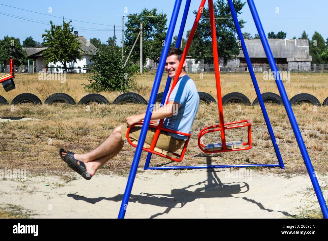 Man swing with kids hi-res stock photography and images - Alamy
