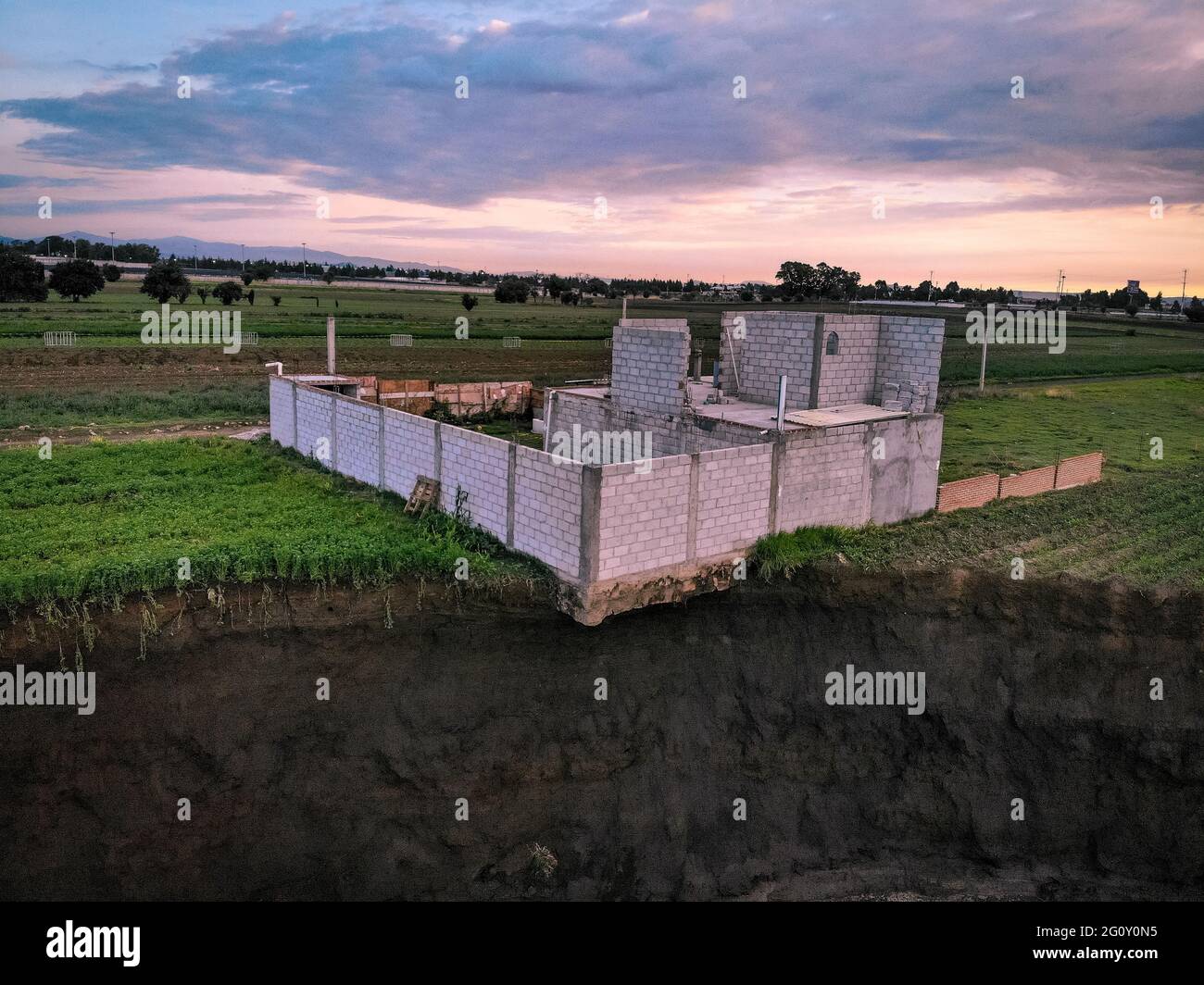 Santa Maria Zacatepec, Mexico. 02nd June, 2021. A half-finished house ...