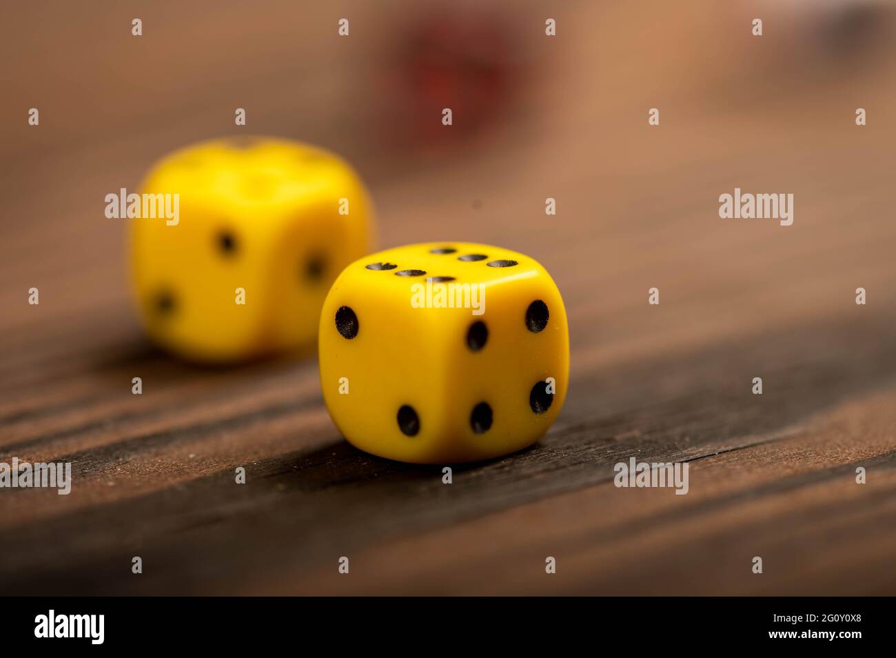 Yellow dice hi-res stock photography and images - Alamy