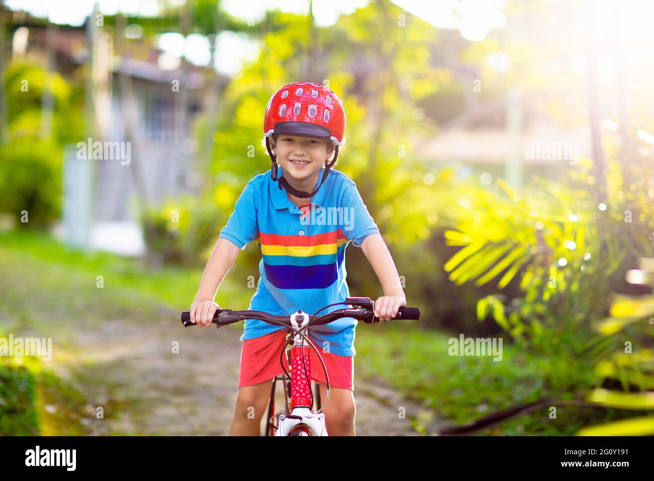 Children going school bicycle in hi-res stock photography and images ...