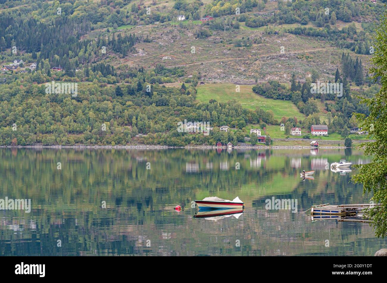 Reflection in Norway fjord at fall time Stock Photo - Alamy