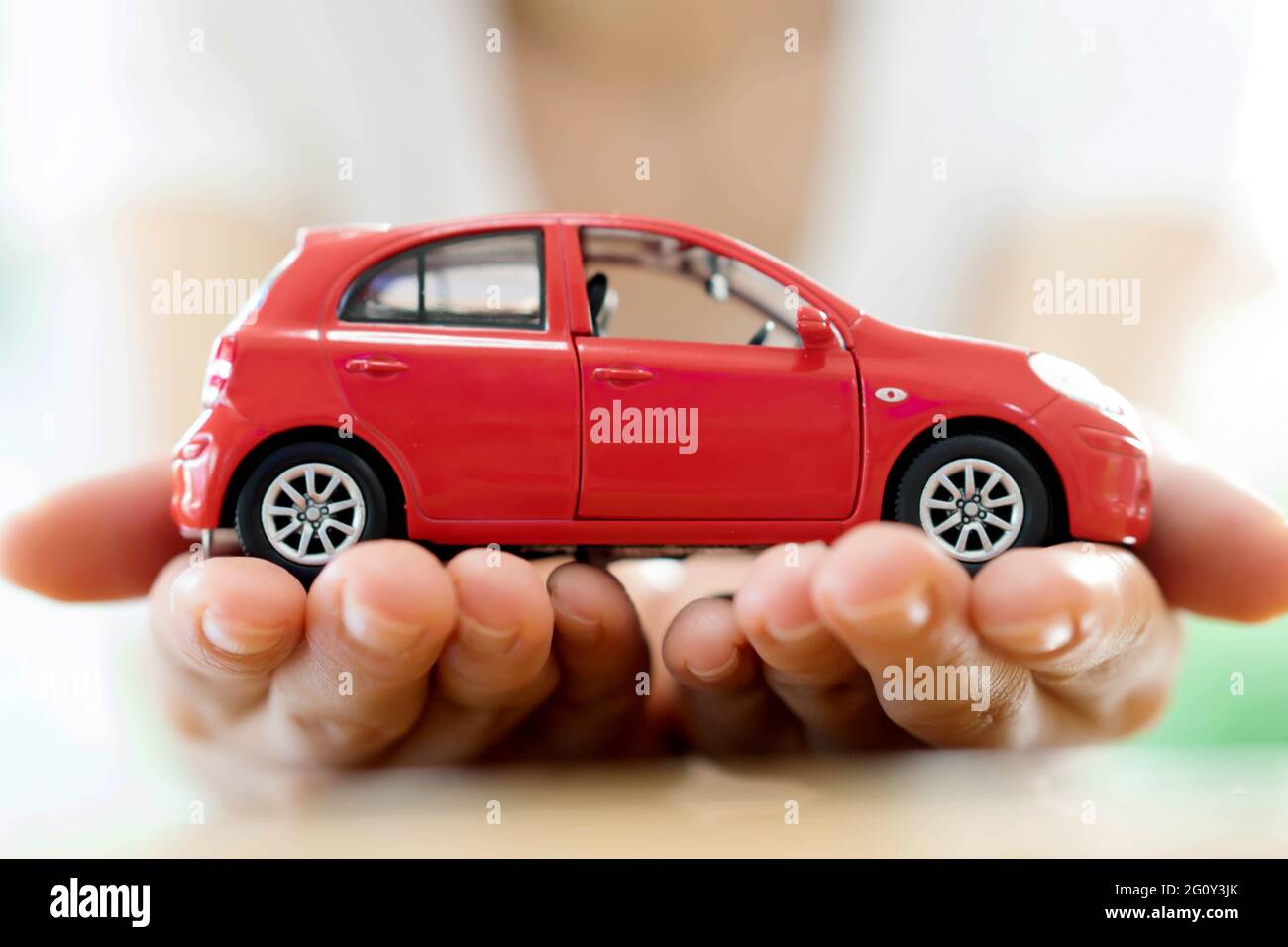 Hand with car. Auto dealership and rental concept background Stock ...