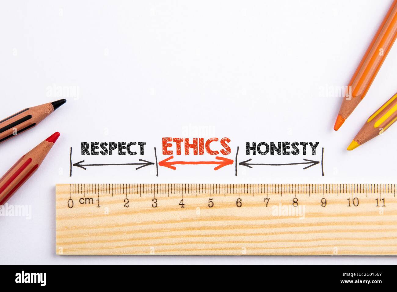 Ethics, Respect and Honesty concept. Wooden liner with colored pencils ...