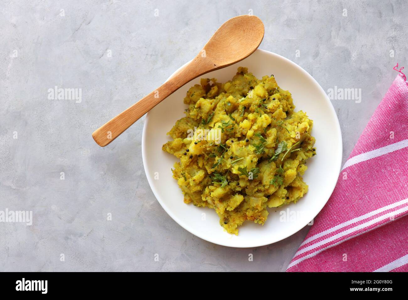 Indian boiled mashed potatoes curry or sabzi. Alu ki sukhi sabzi. Also ...