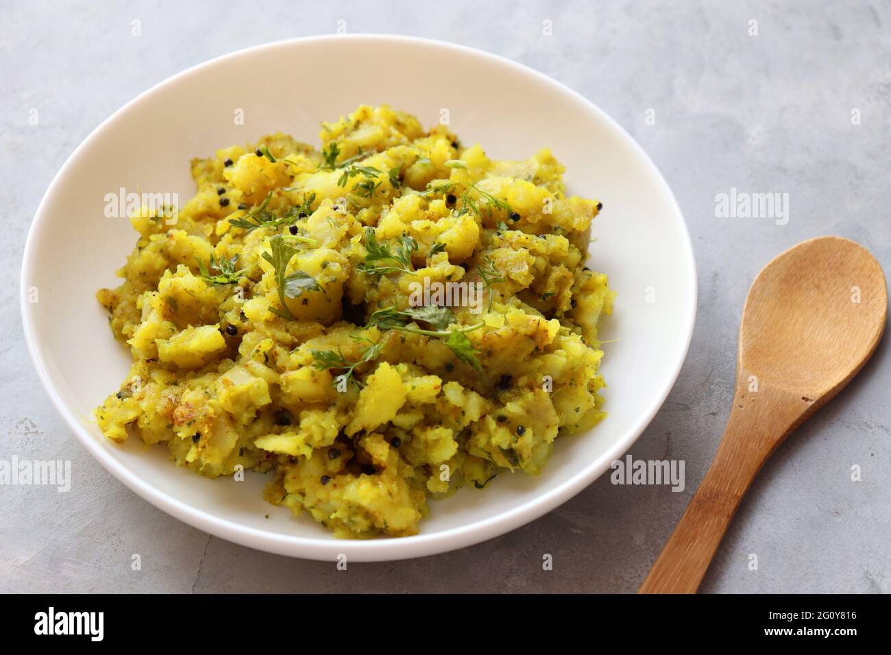 Indian boiled mashed potatoes curry or sabzi. Alu ki sukhi sabzi. Also ...