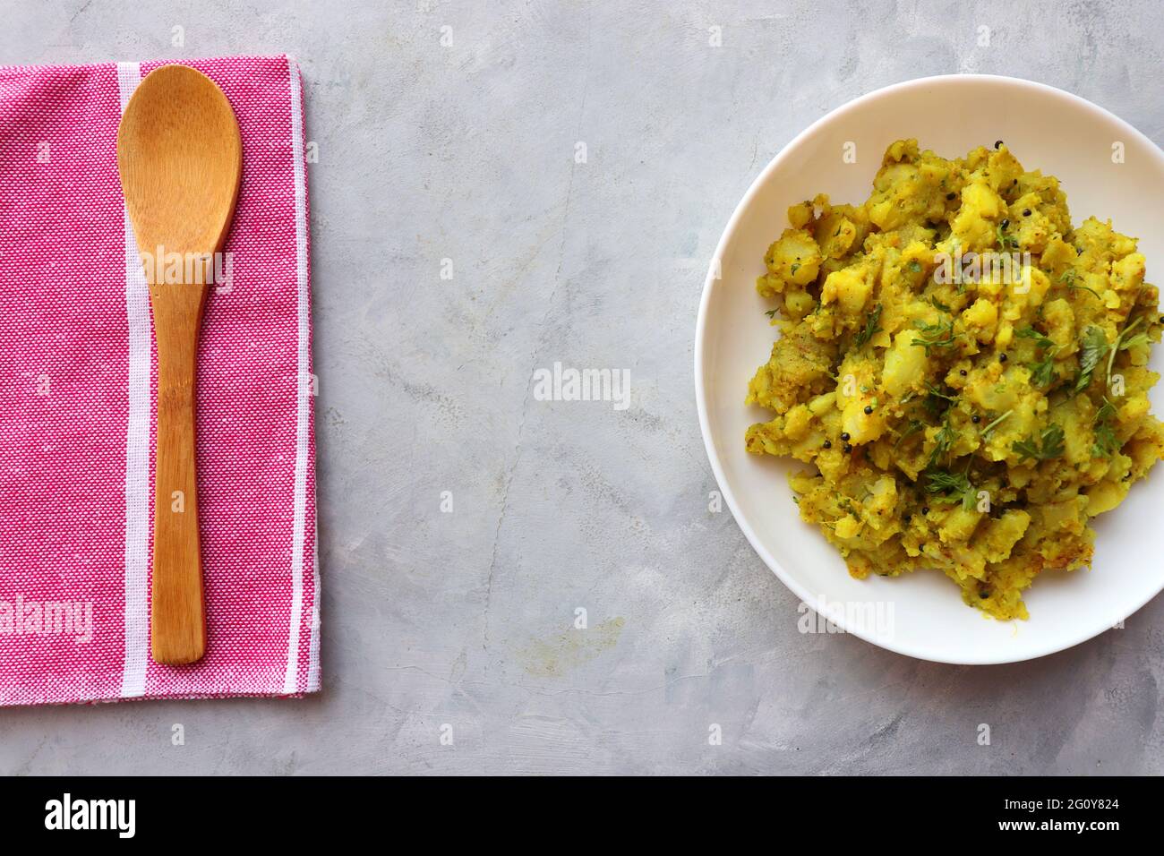 Indian boiled mashed potatoes curry or sabzi. Alu ki sukhi sabzi. Also ...