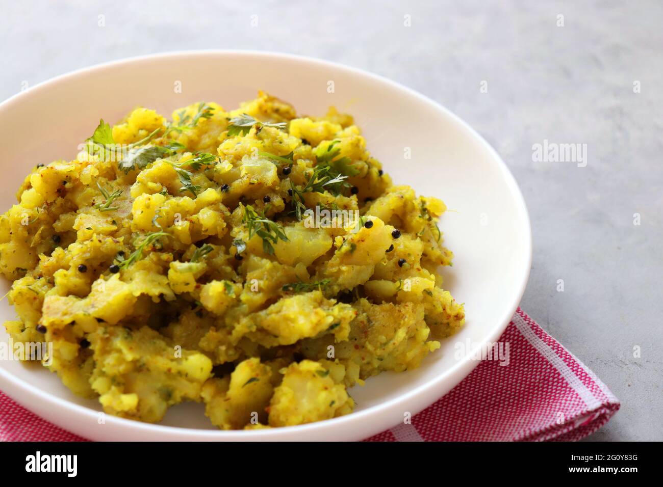 Indian boiled mashed potatoes curry or sabzi. Alu ki sukhi sabzi. Also ...
