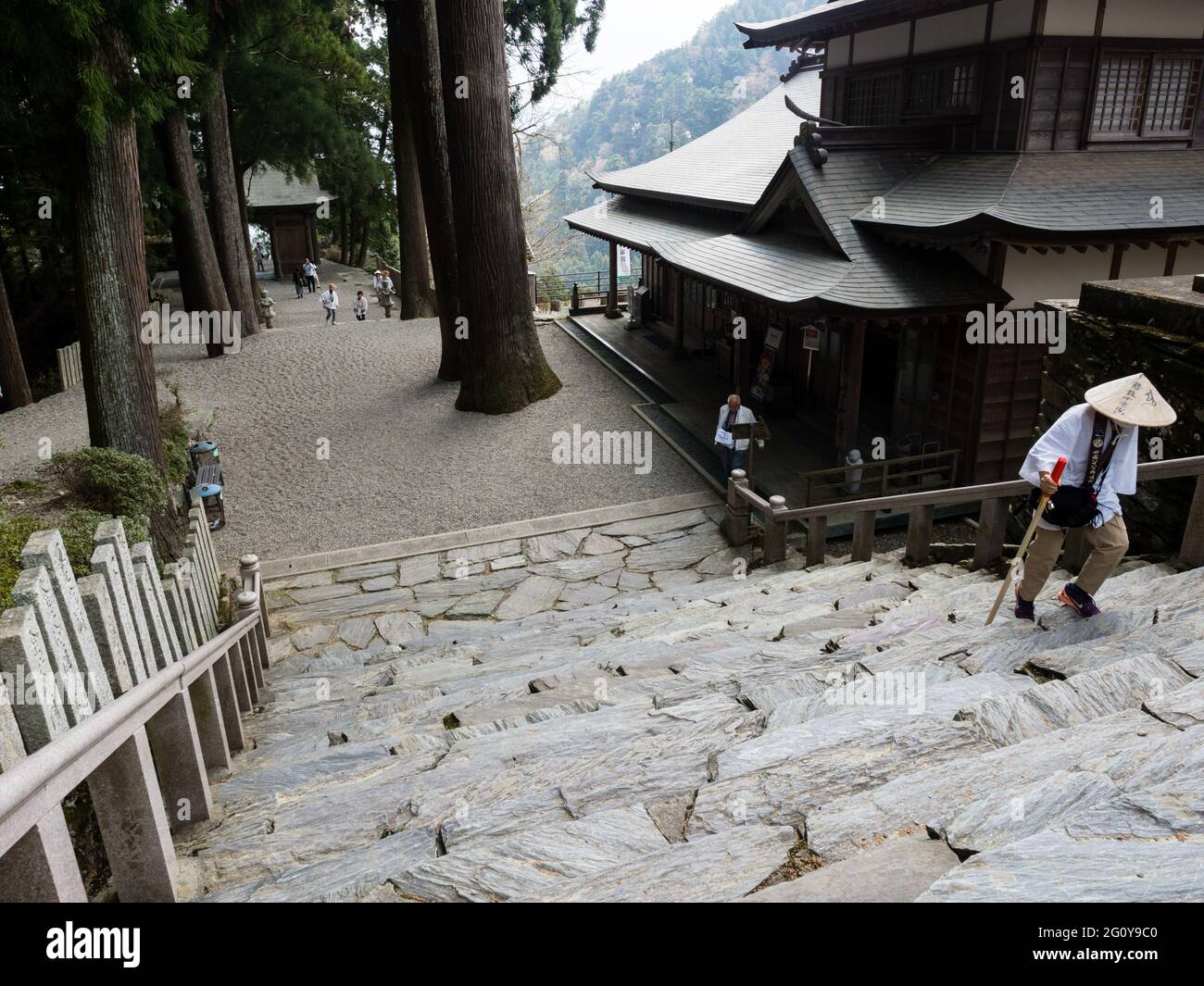 Tokushima, Japan - April 3, 2018: Buddhist pilgrim climbing the stairs ...