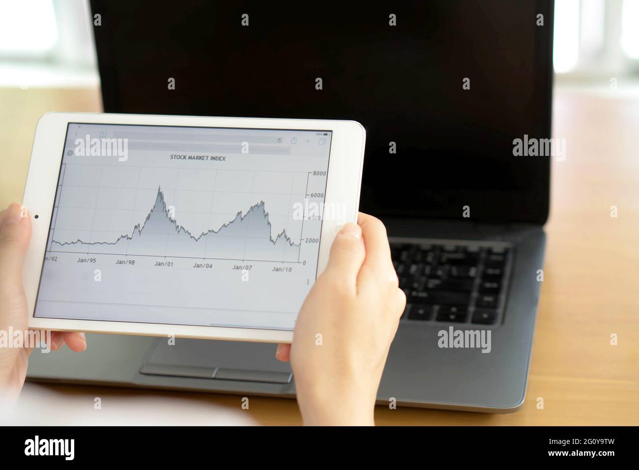 Stock market chart digital tablet Stock Photo - Alamy