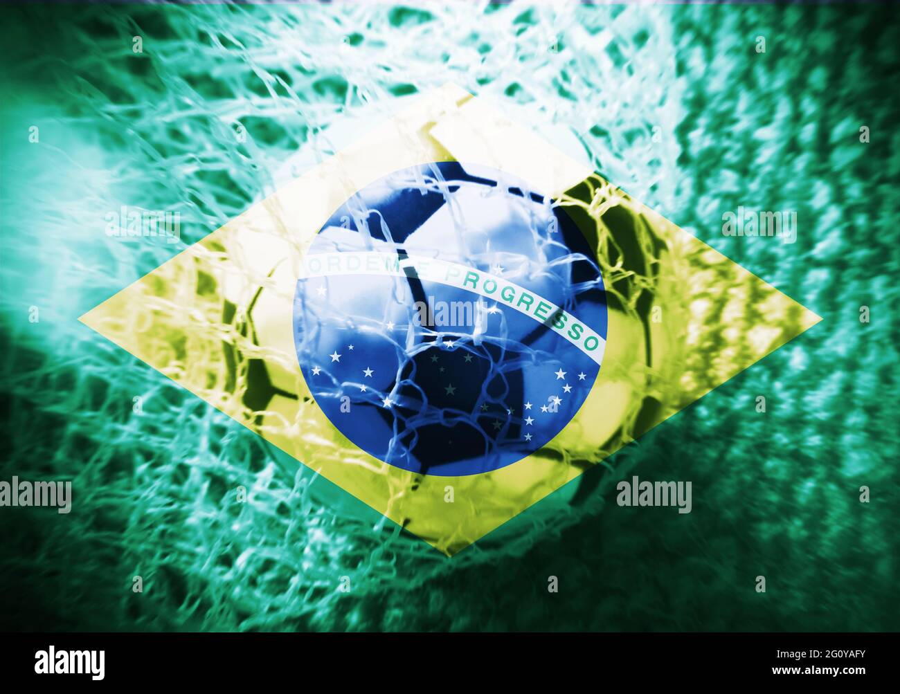 Soccer ball inside the net, with the Brazilian flag as background ...