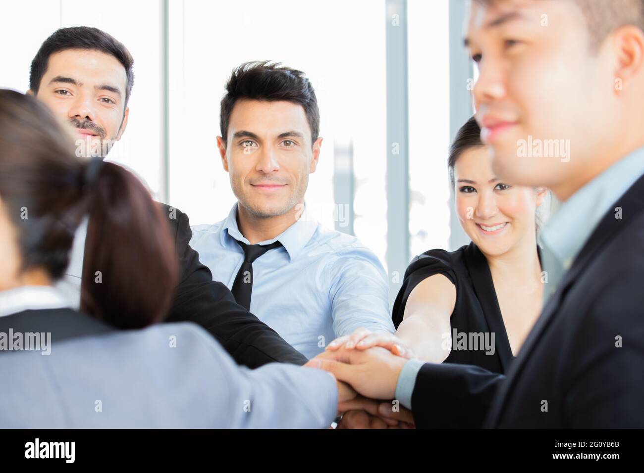 Business people putting their hands together. Stack of hands. Unity team and teamwork concept ...
