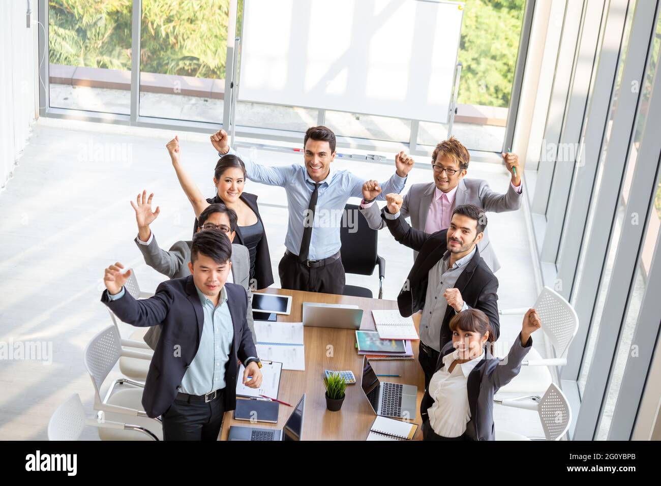 Successful startup entrepreneurs and business people team achieving ...