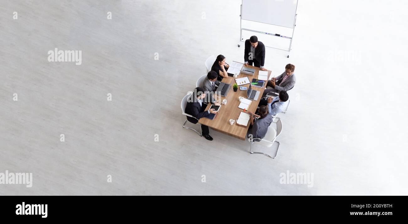 Top view of group of multiethnic busy people working in an office ...