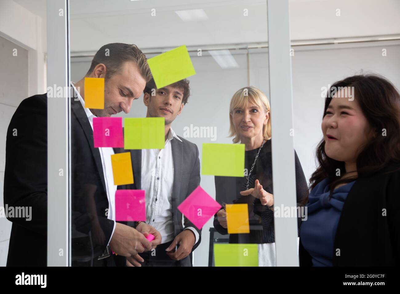 Business people meeting team, briefing and discussing new plan ...