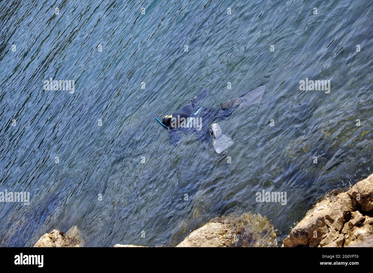 Underwater hunter in action Stock Photo - Alamy