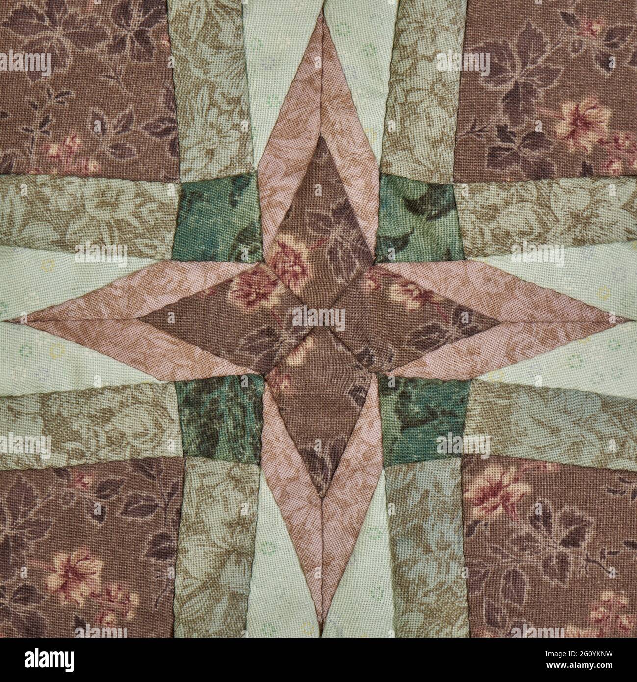 Patchwork block from pieces of fabrics, detail of quilt Stock Photo - Alamy