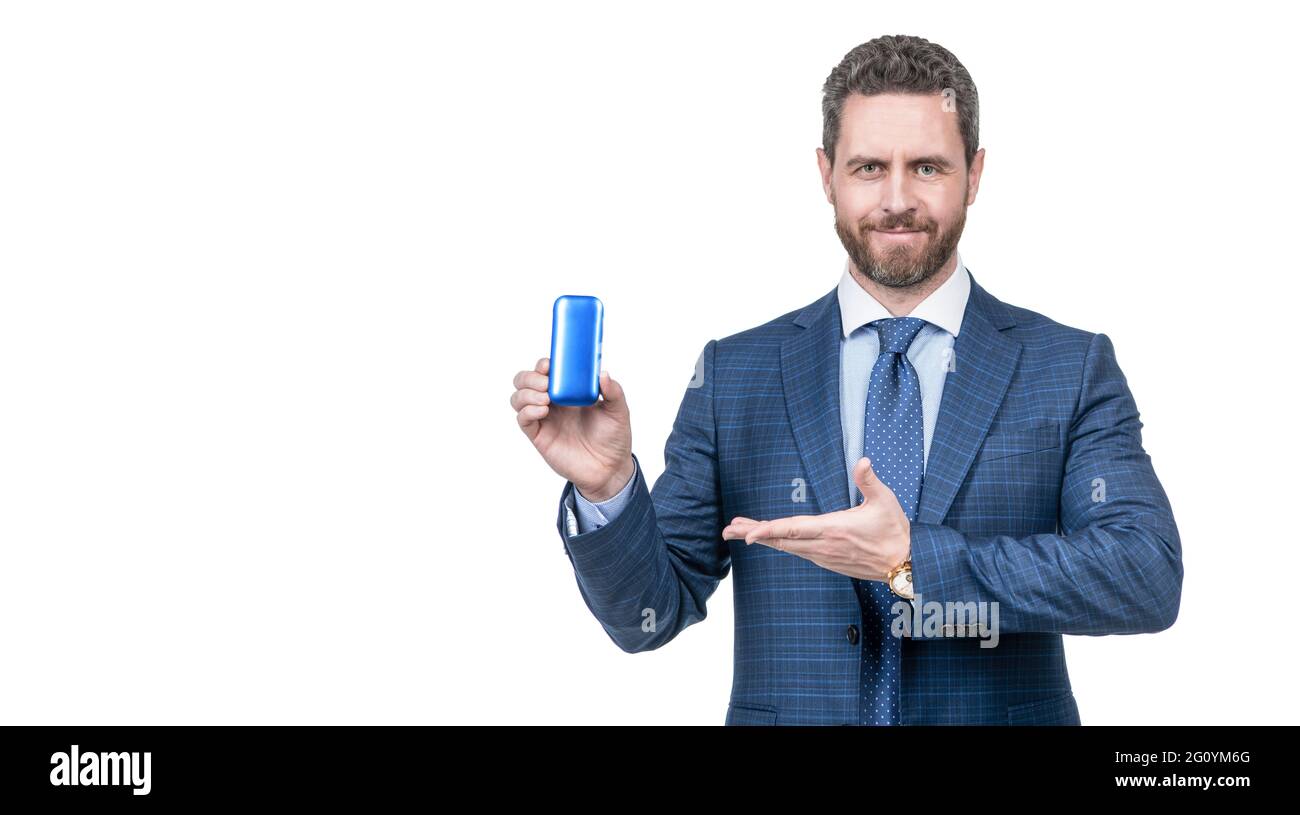 businessman demonstrating modern gadget. successful ceo holding blue ...