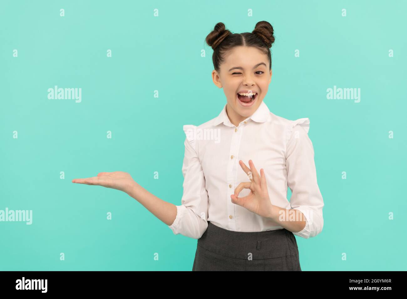 Our aim is your satisfaction. Schoolchild give ring gesture showing ...