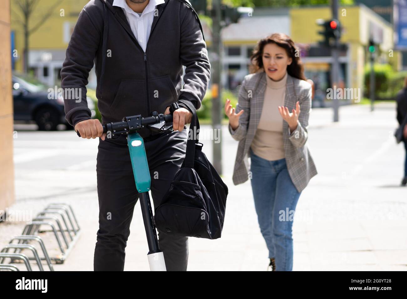 Pickpocket Robber Stealing Bag In Street. Robbery Crime Stock Photo - Alamy