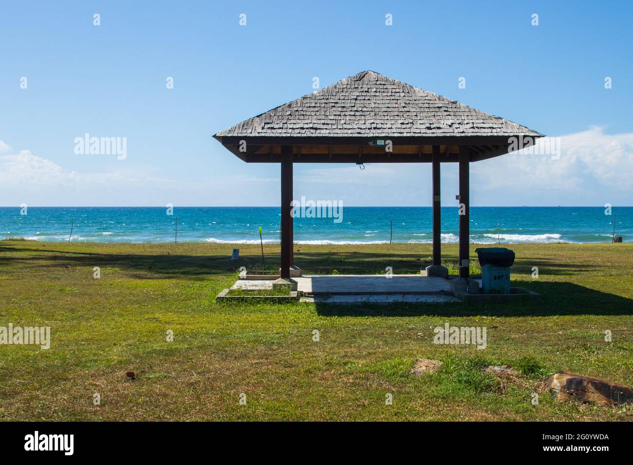 A beautiful scenery of a hut with blue sky at beach Stock Photo - Alamy