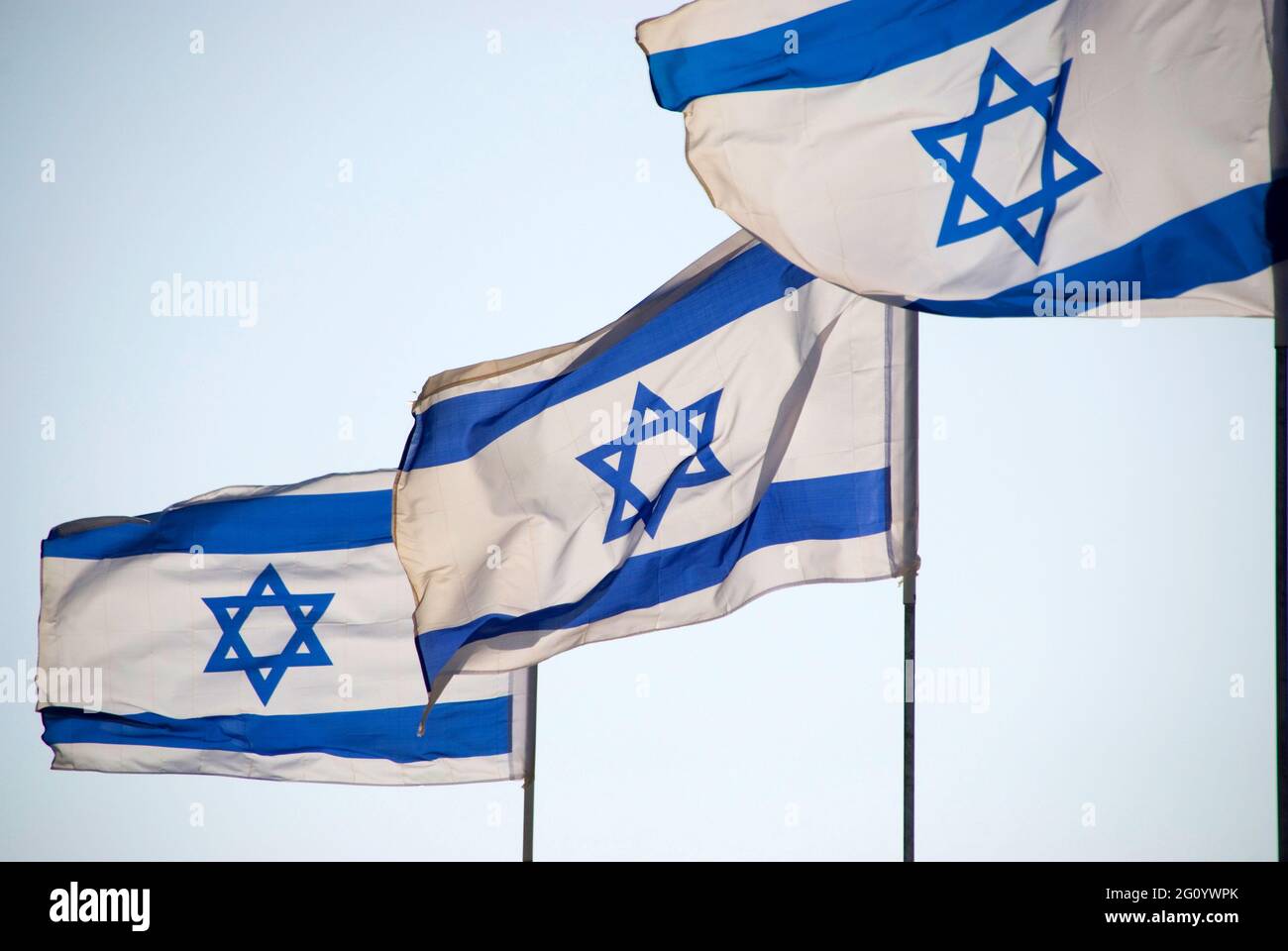 Flags of Israel on a pole Stock Photo - Alamy