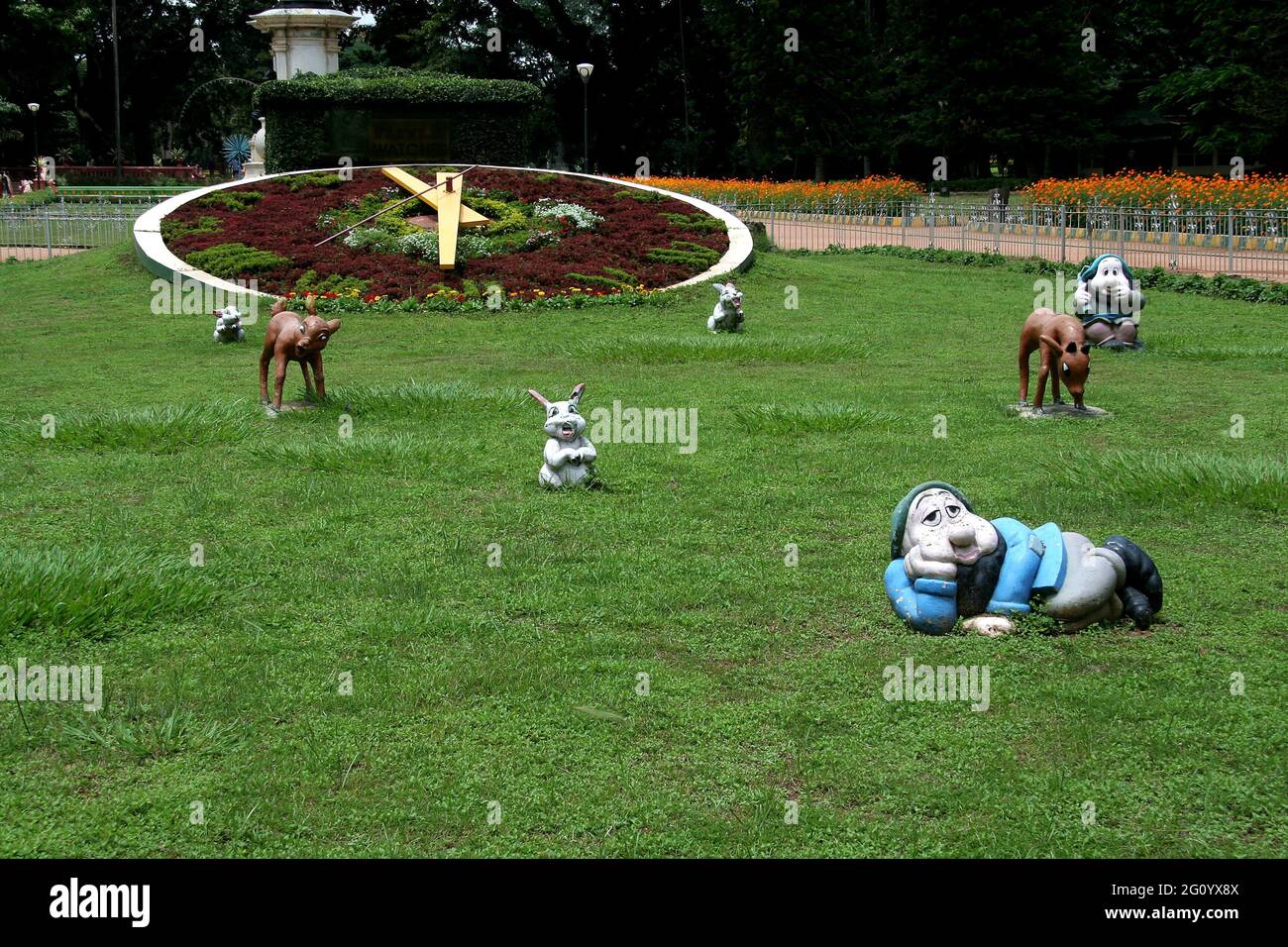 BENGALURU, INDIA - Aug 12, 2010: Flower Clock on Grass Bed at famous ...