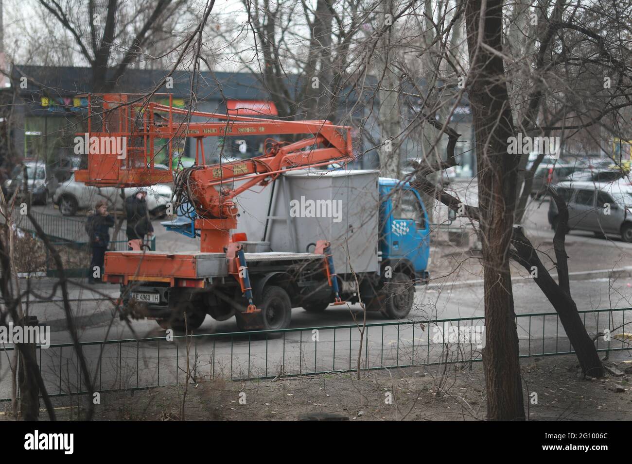 working street in the city where people are doing work Stock Photo - Alamy