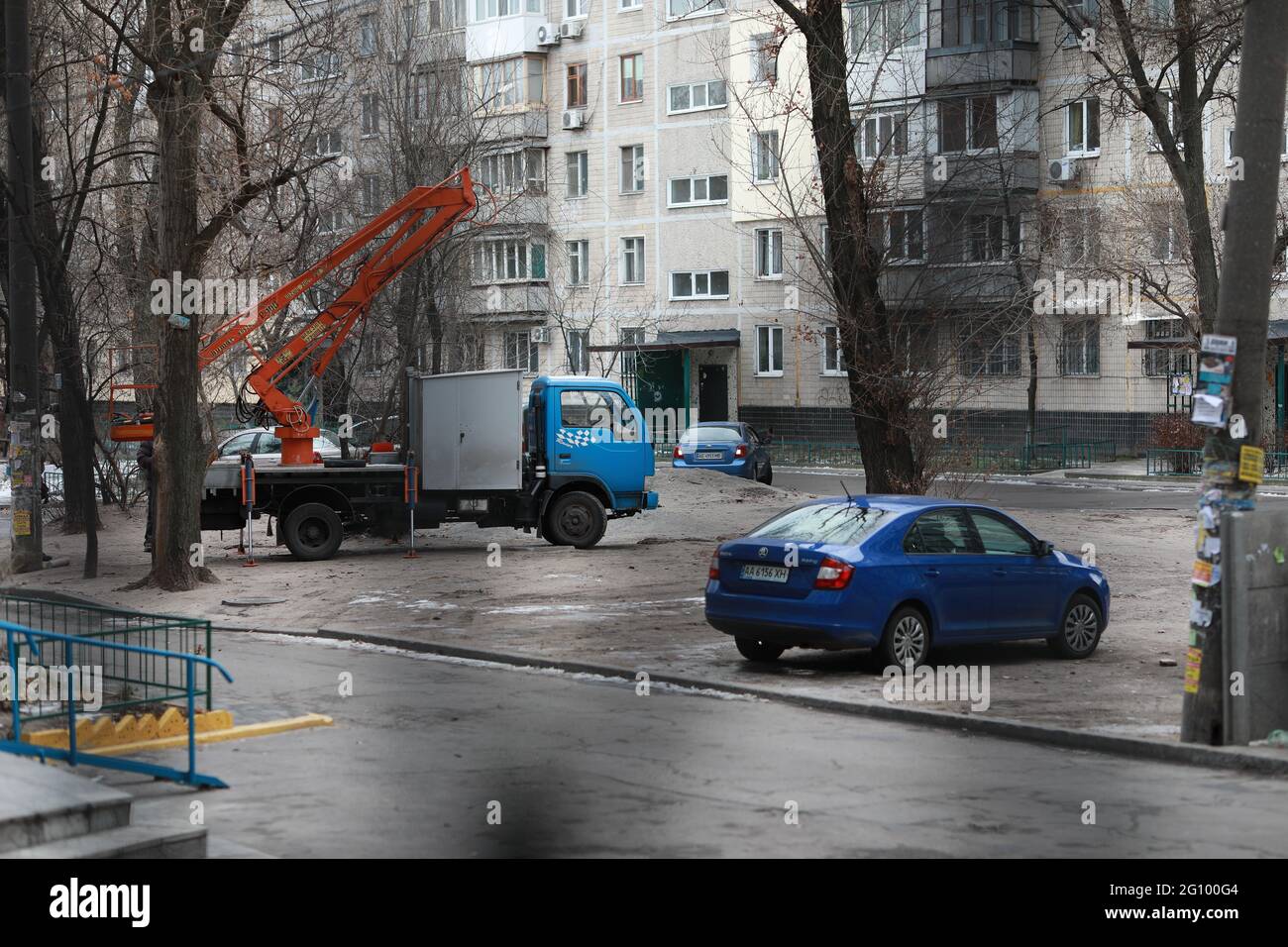working street in the city where people are doing work Stock Photo - Alamy